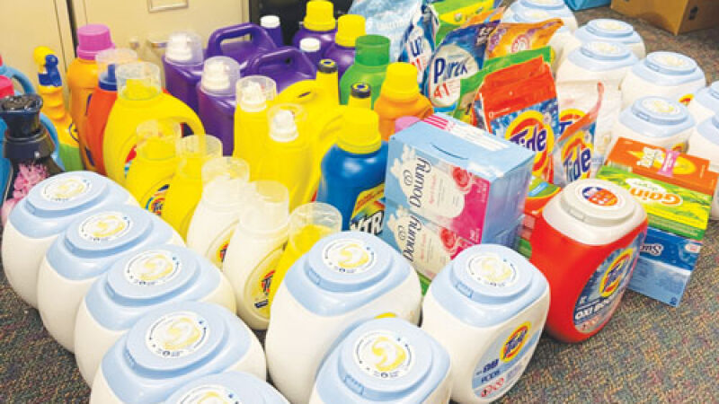 Students lead laundry supplies project for families in need