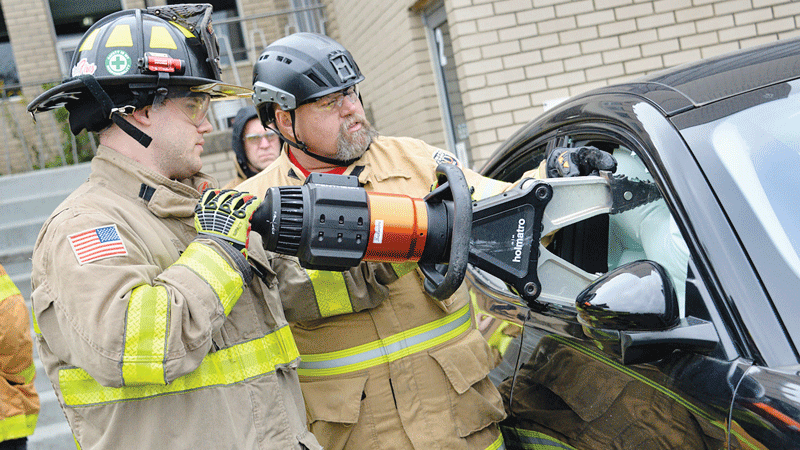 Fire departments practice with Jaws of Life using modern cars