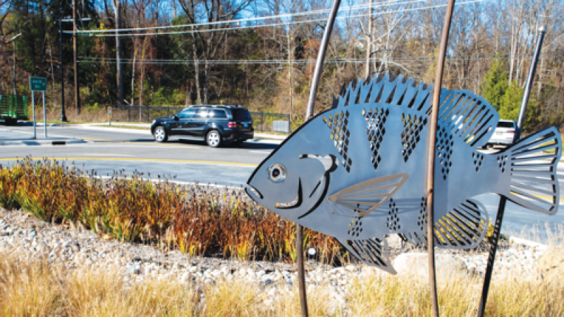 New fish sculptures grace roundabout near Yates Cider Mill
