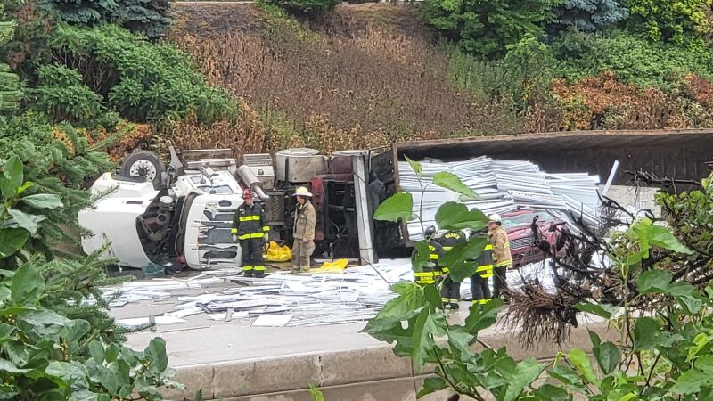 Tractor-trailer rollover snarls traffic on I-696 in Warren